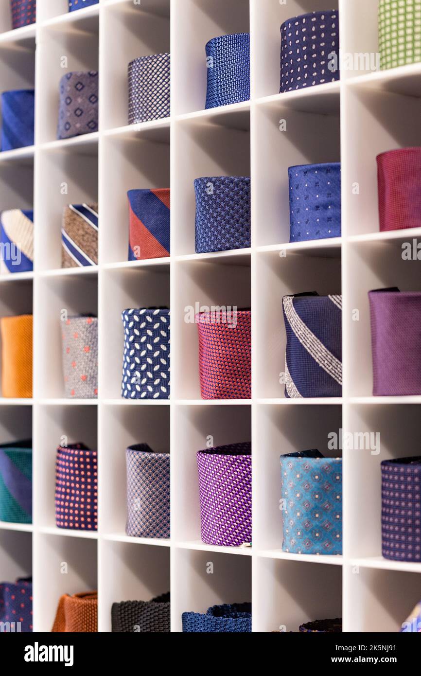 Showcase with multicolored ties. View of different colors ties in ...