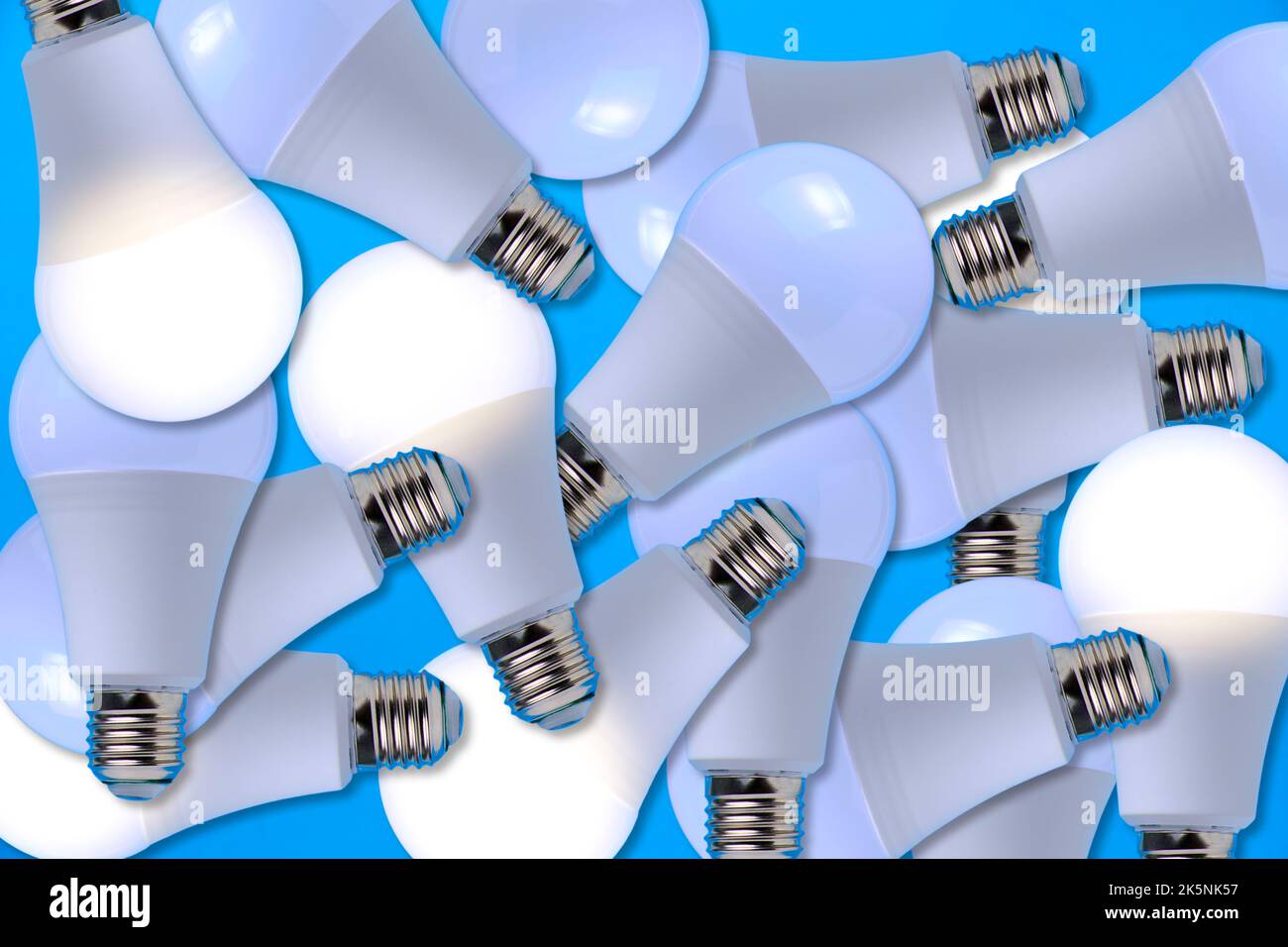 Included and burnt out LED eco friendly lamps blue background Stock ...