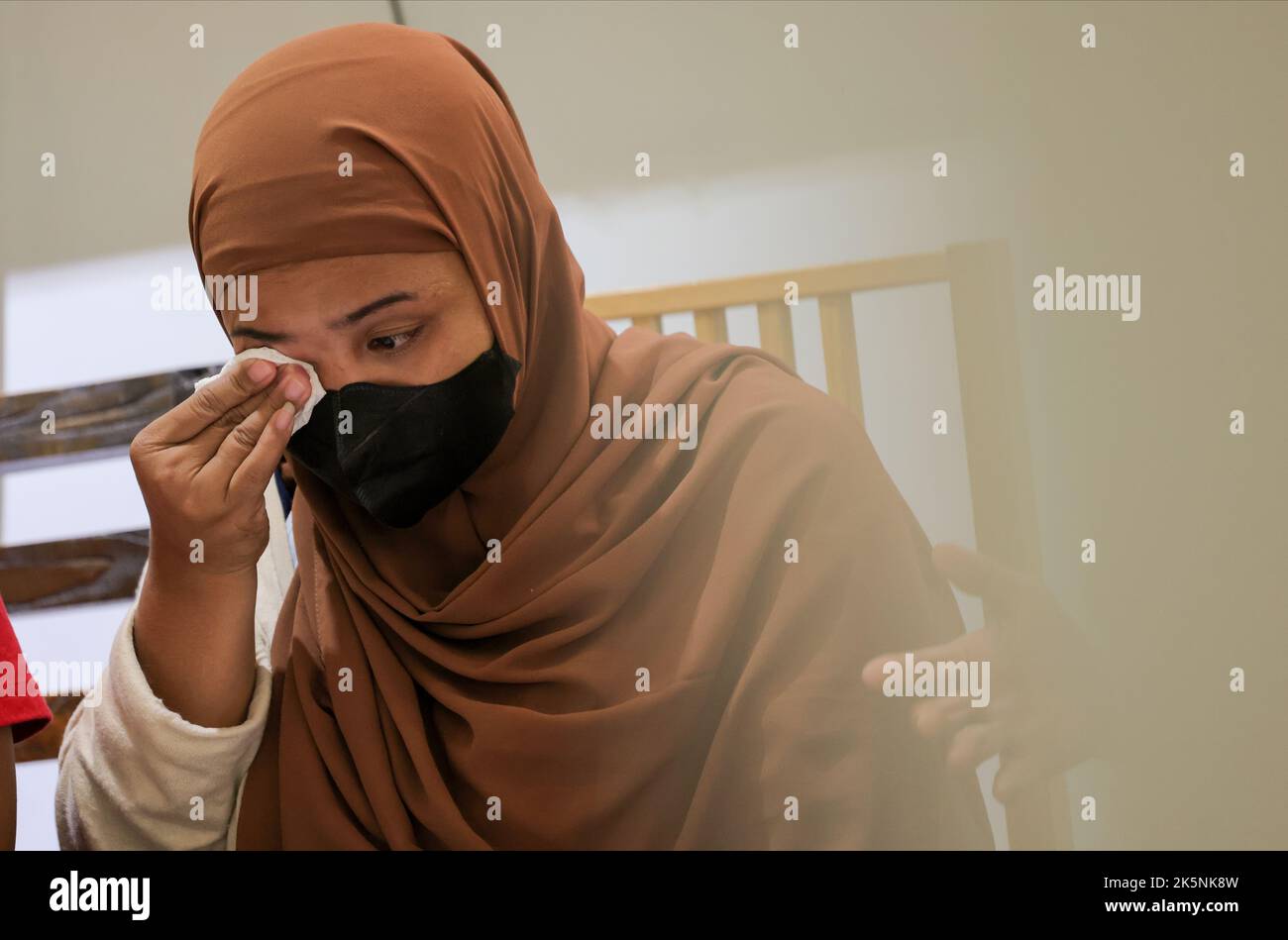 Former Indonesian domestic helper Kartika Puspitasari attends a press ...