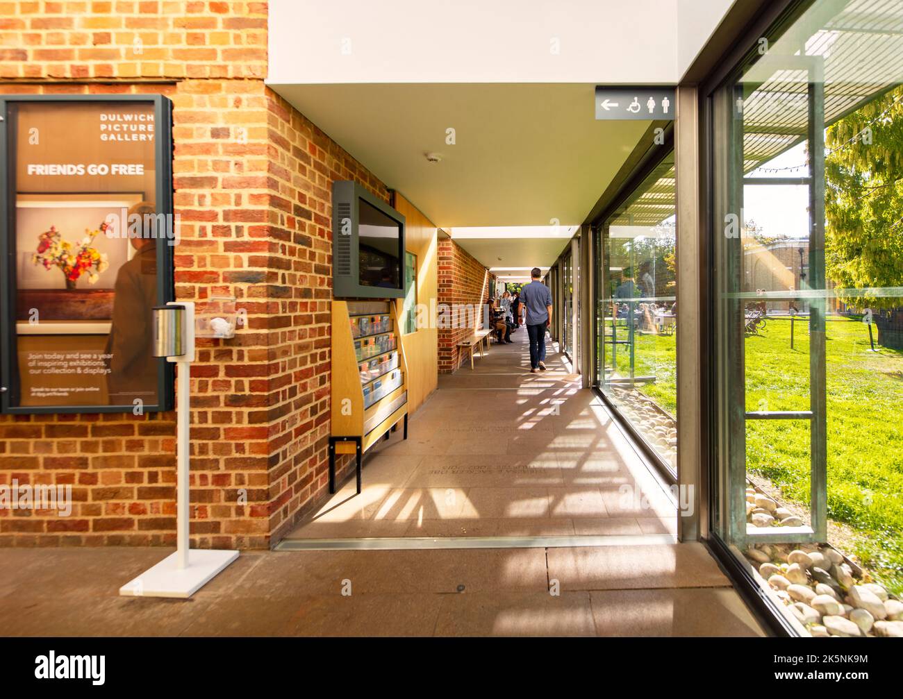 Corridor with large glass walls inside Dulwich Picture Gallery in ...