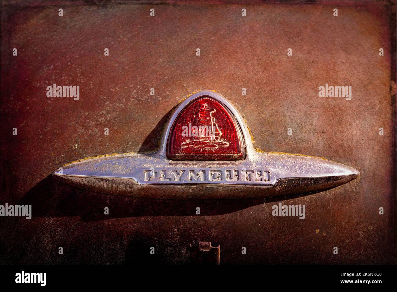 Silvana WA USA: 09-07-2022: Plymoth Car Badge on an old rusting trunk ...