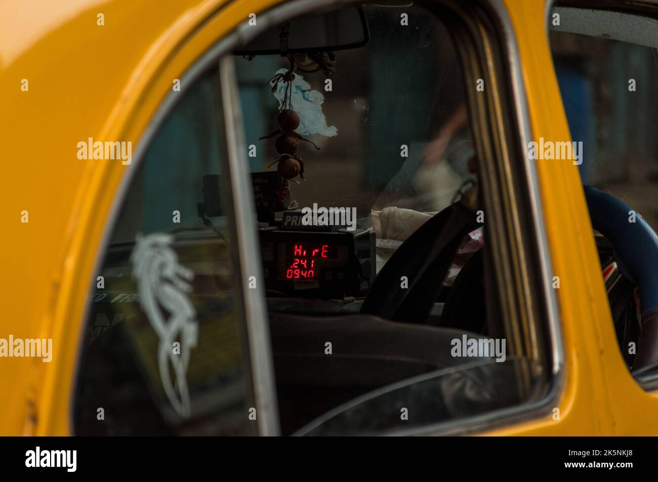 The inside of a yellow cab taxi Stock Photo - Alamy