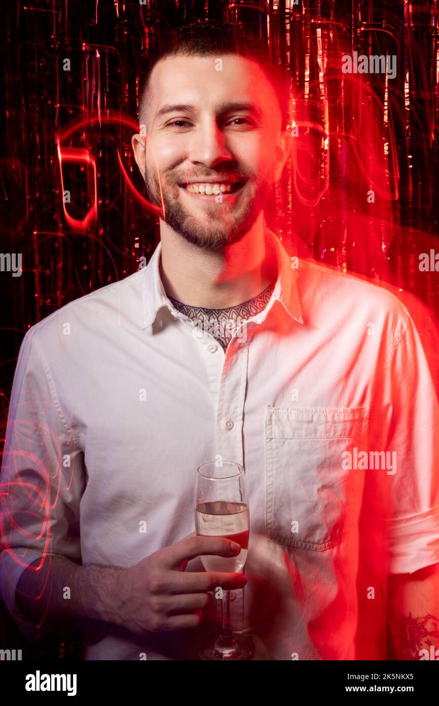 christmas toast happy festive man enjoying party Stock Photo - Alamy