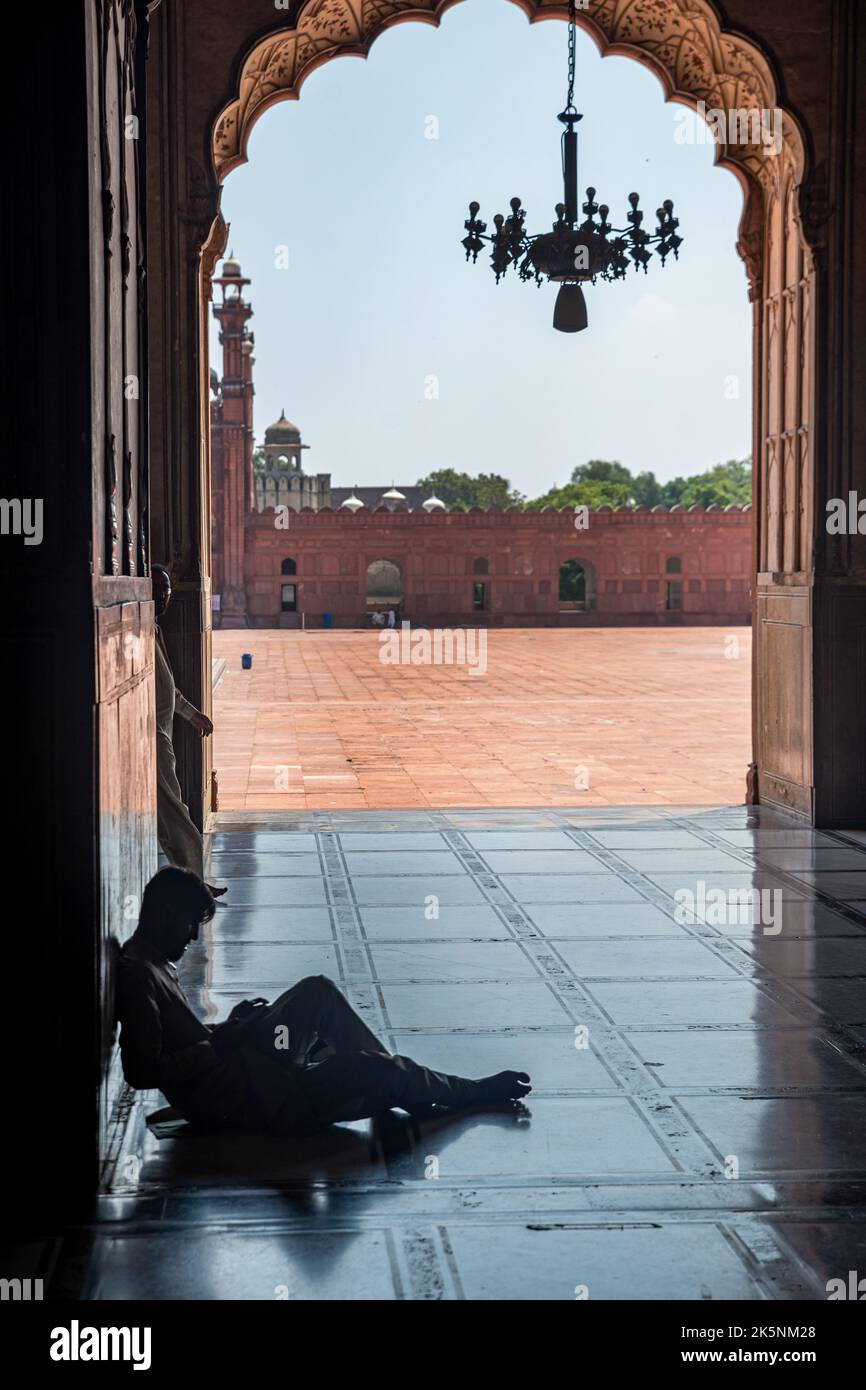 Badshahi Mosque porticos colonnade, Fort Lahore, Pakistan Stock Photo ...