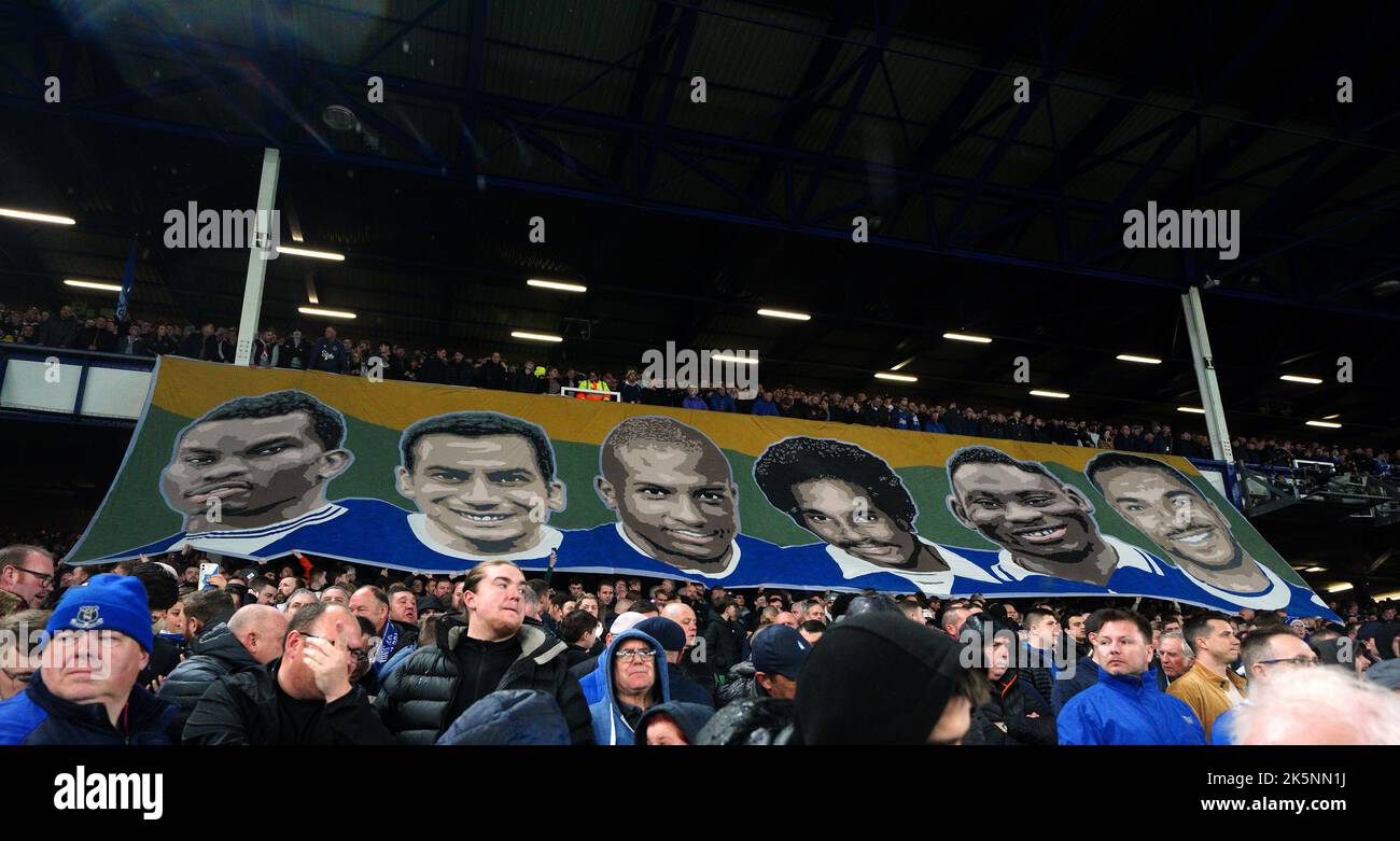 Everton fans in the stands with a banner tribute featuring some of ...