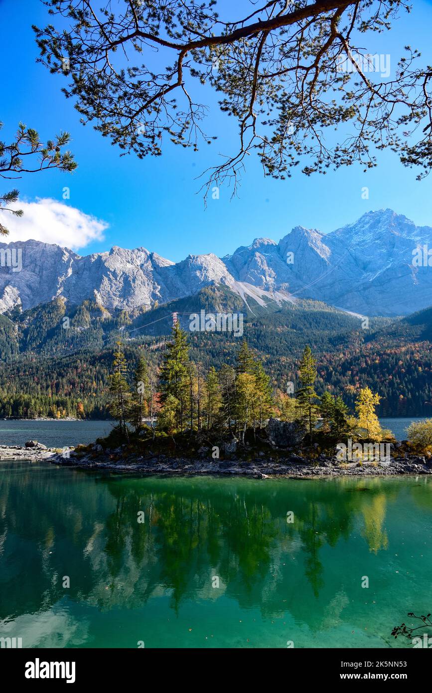 Island in the Eibsee near Grainau, below the Zugspitze (2962 m) in the ...