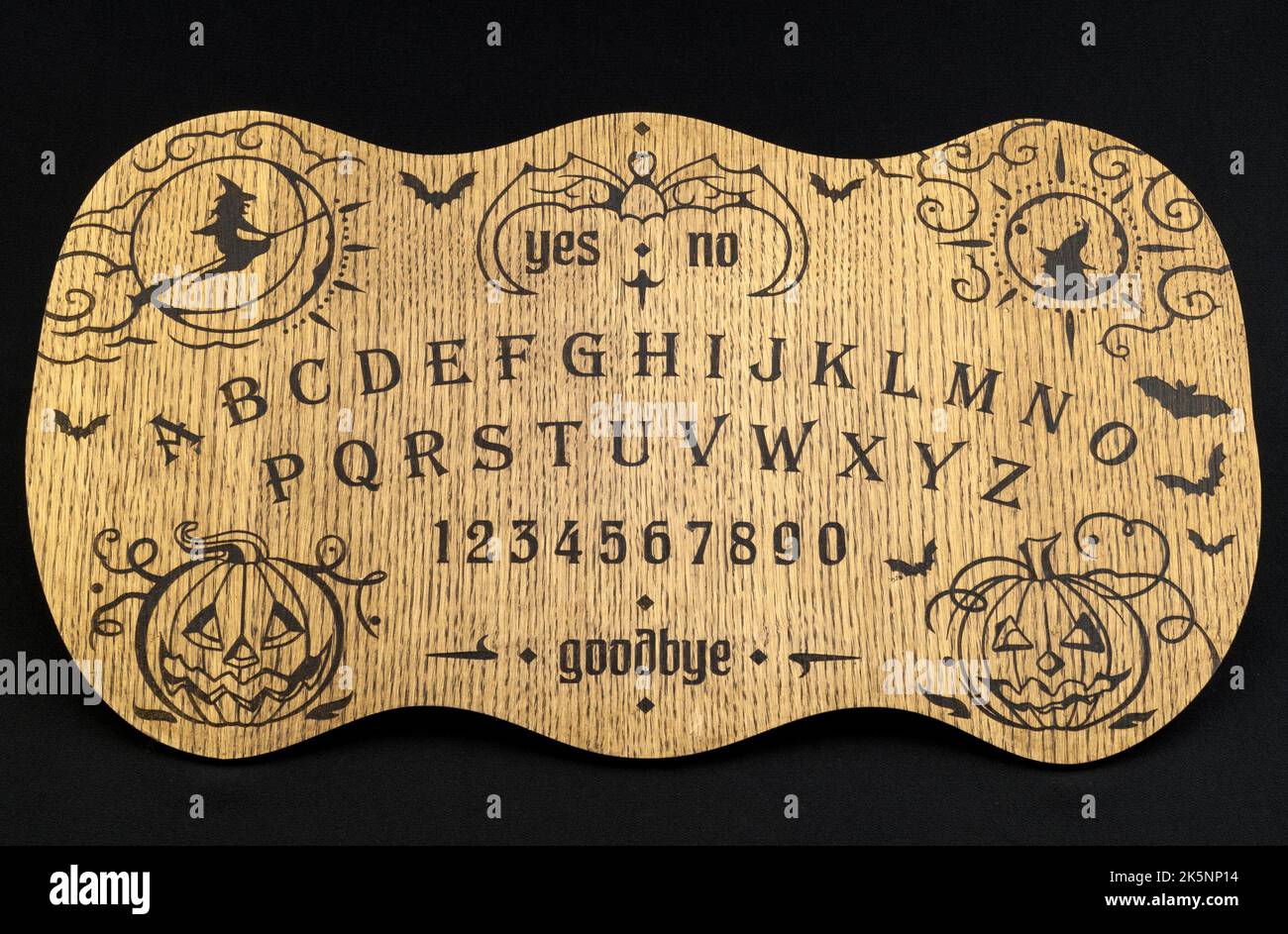 Ouija board hands hi-res stock photography and images - Alamy
