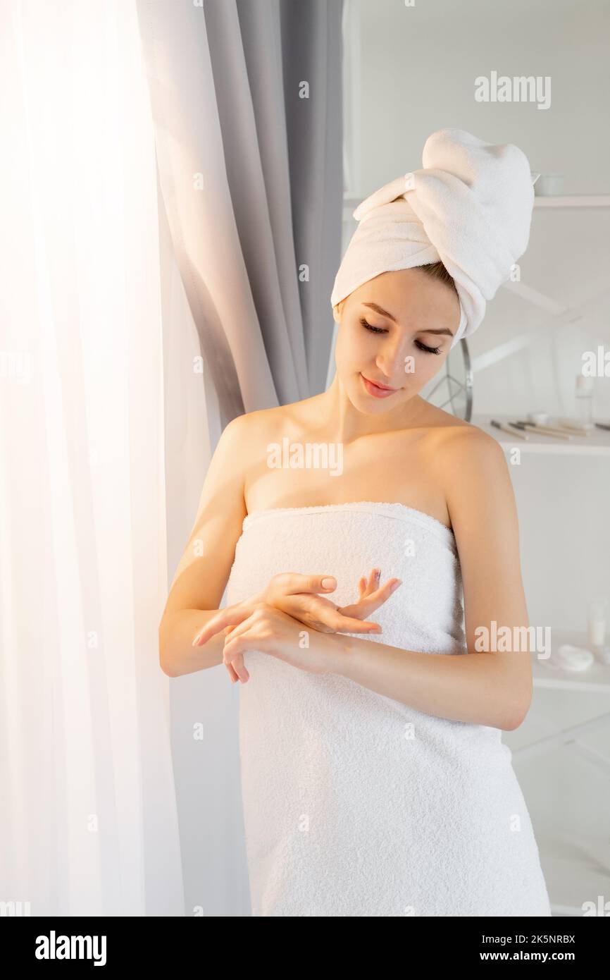 Beauty care cosmetic. Hand treatment. Moisturizing procedure. Pretty ... Beauty care cosmetic. Hand treatment. Moisturizing procedure. Pretty ...