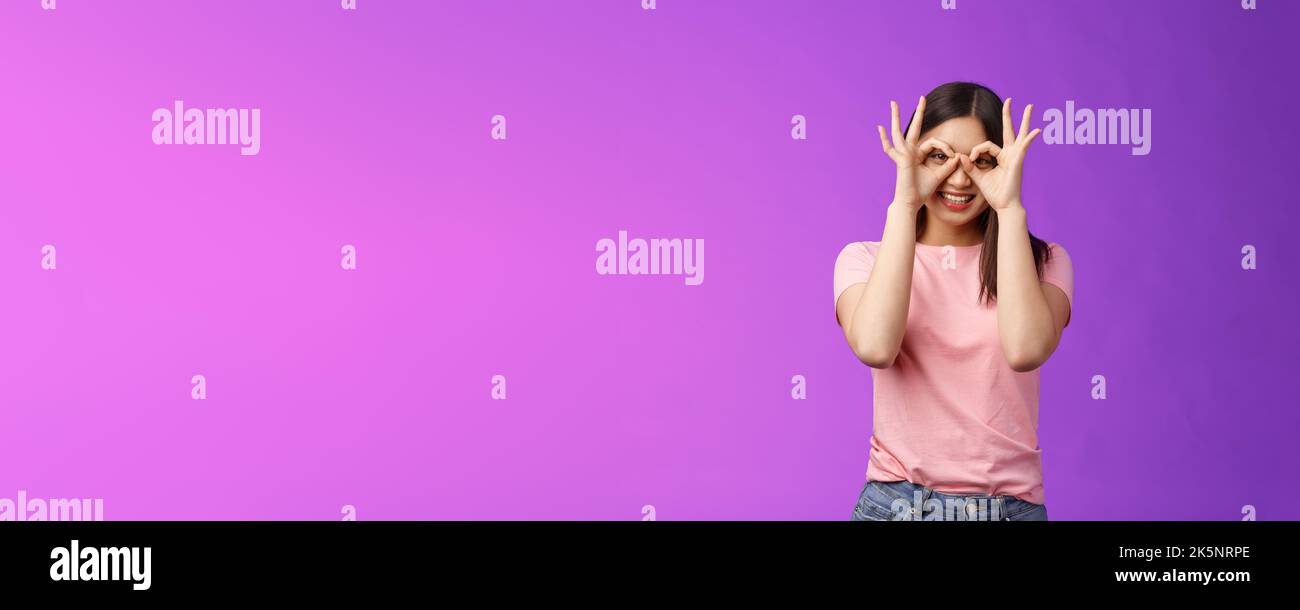 Cheerful friendly carefree asian woman having fun fool around, show ...