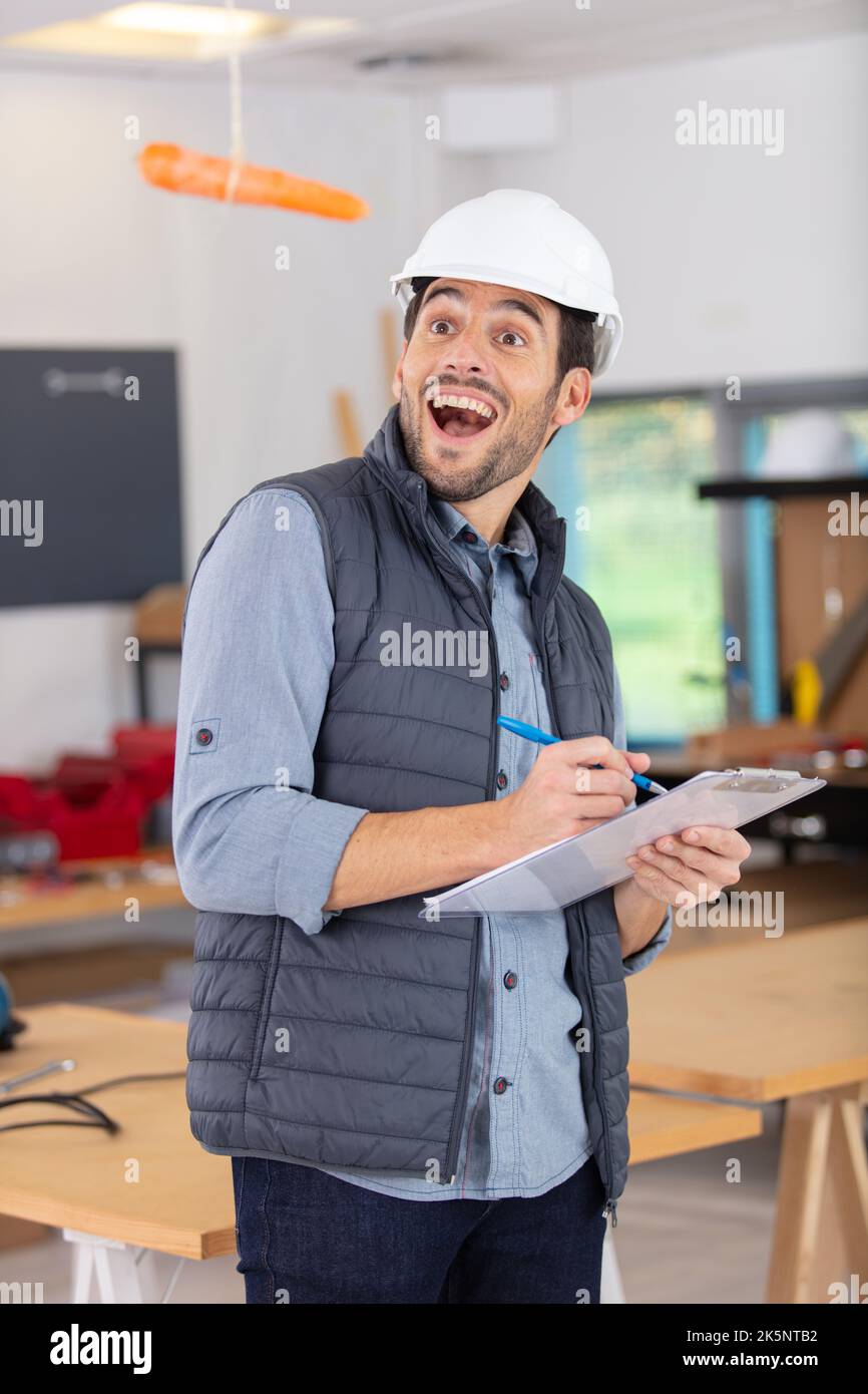 Dangling worker hi-res stock photography and images - Alamy