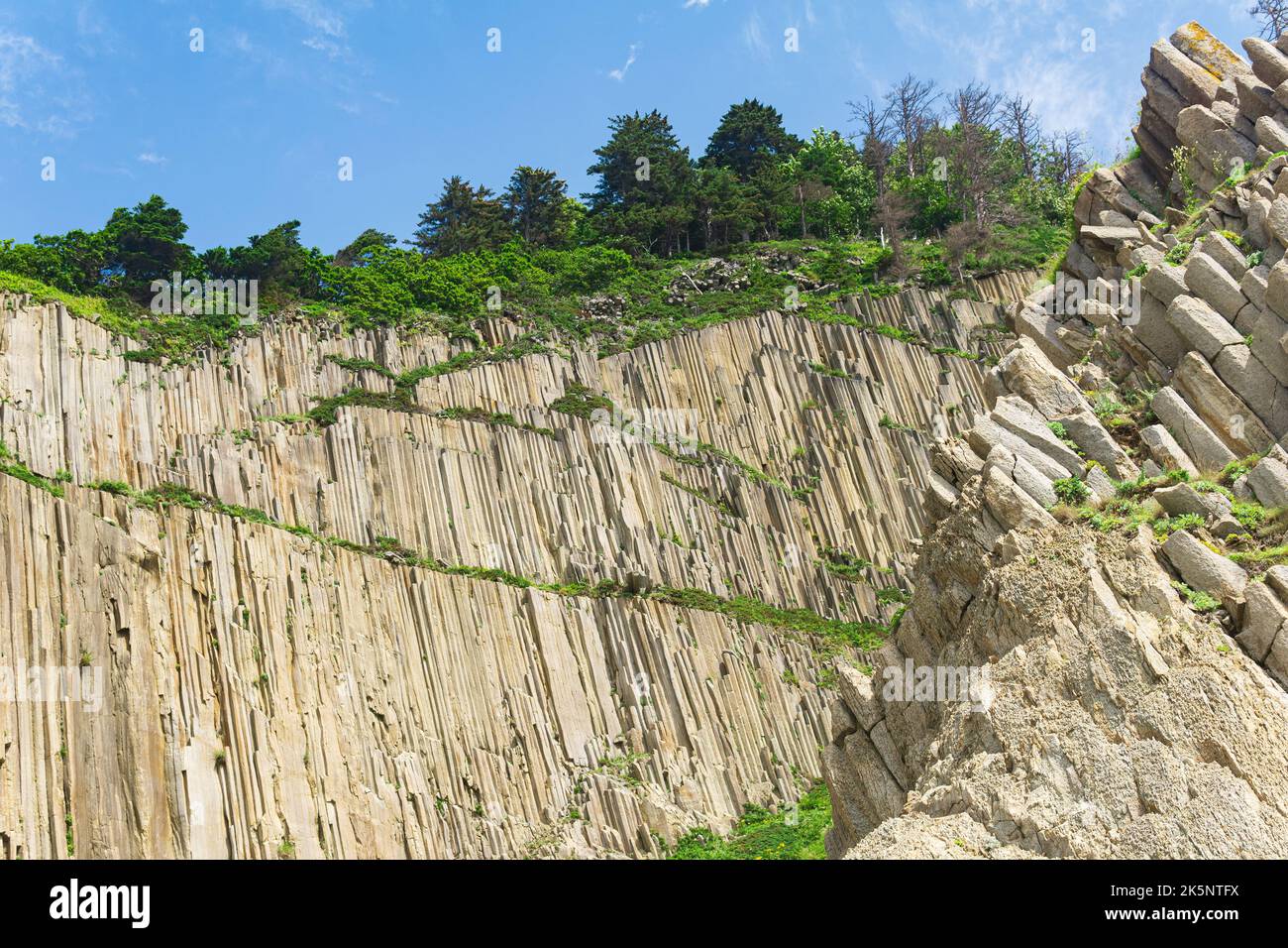 natural landscape with a sheer cliff folded columnar basalt on the ...