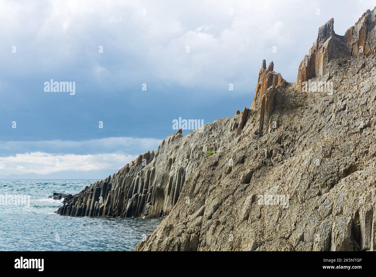 natural landscape with a sheer cliff folded columnar basalt on the ...