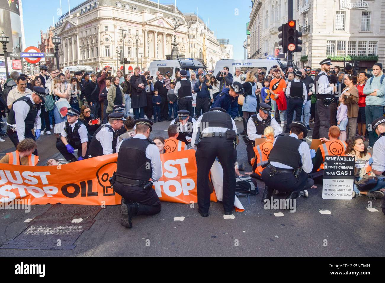 London, UK. 9th October 2022. Just Stop Oil activists glue themselves ...