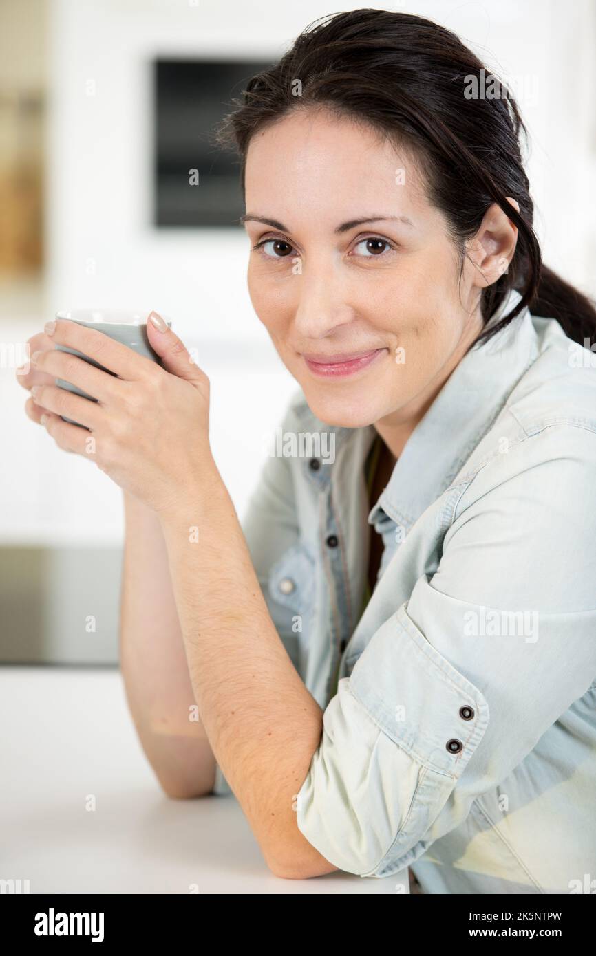 beautiful woman having a cuppa Stock Photo - Alamy