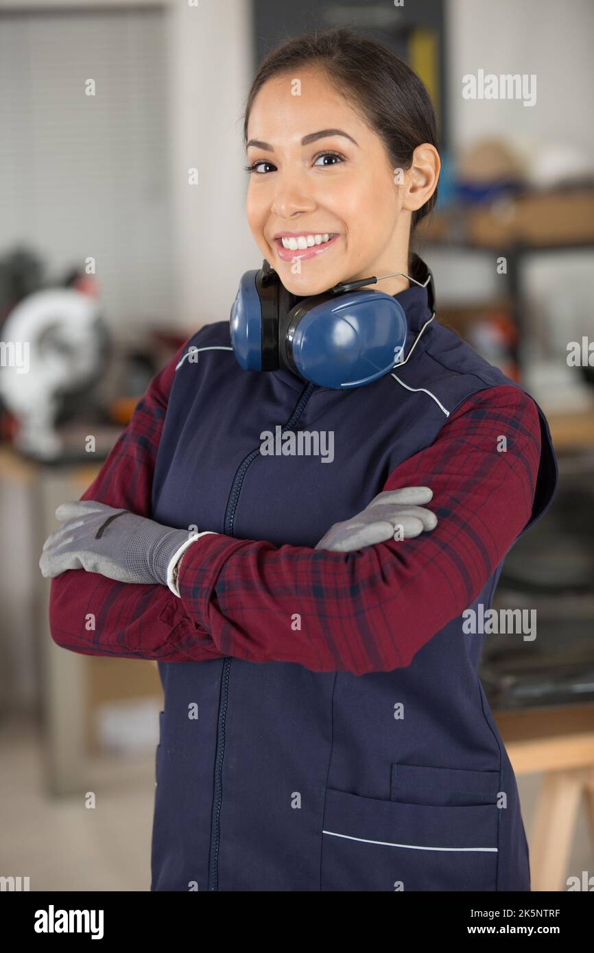 woman worker in her metal workshop posing Stock Photo - Alamy