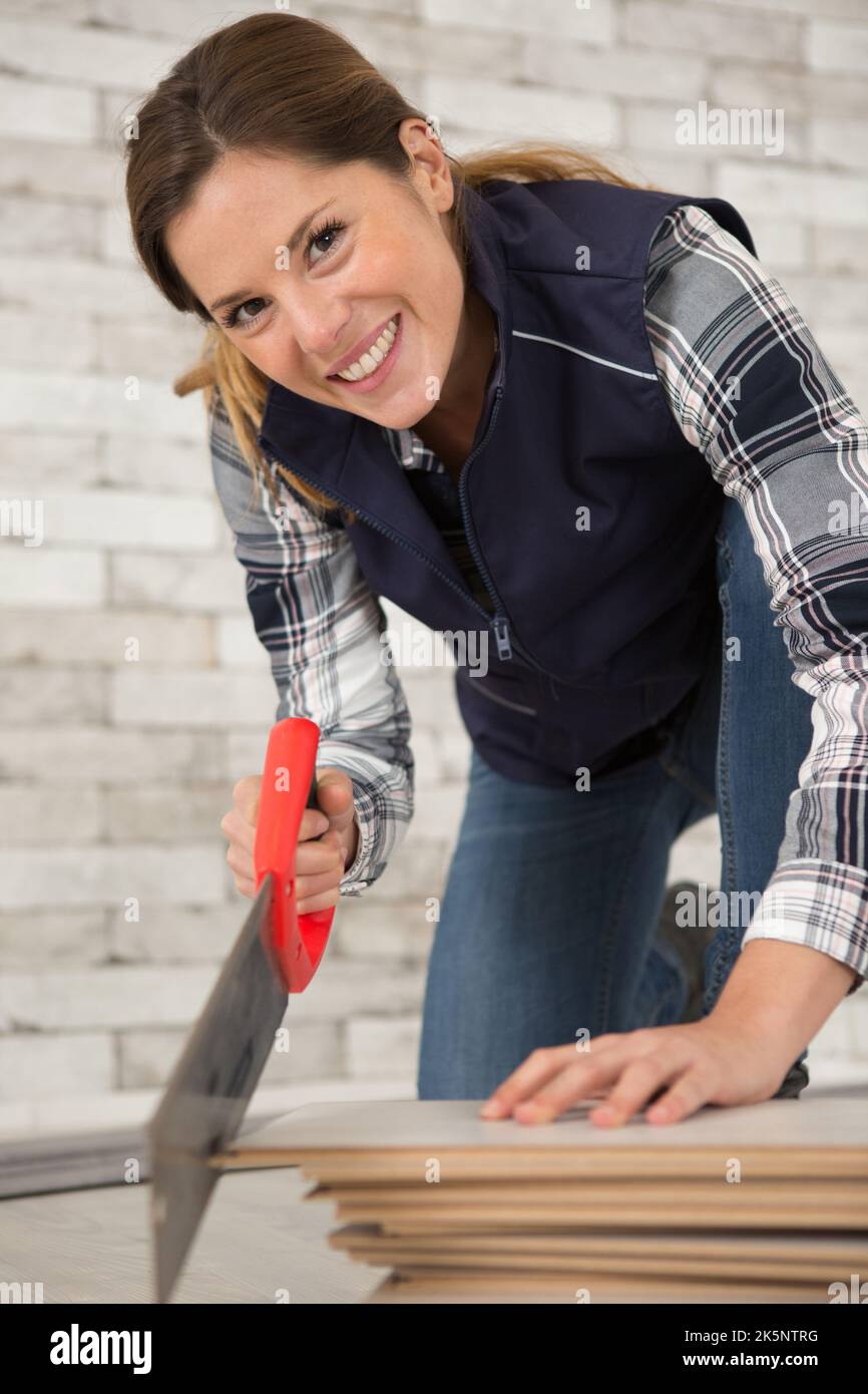 Sawing timber woman hi-res stock photography and images - Alamy