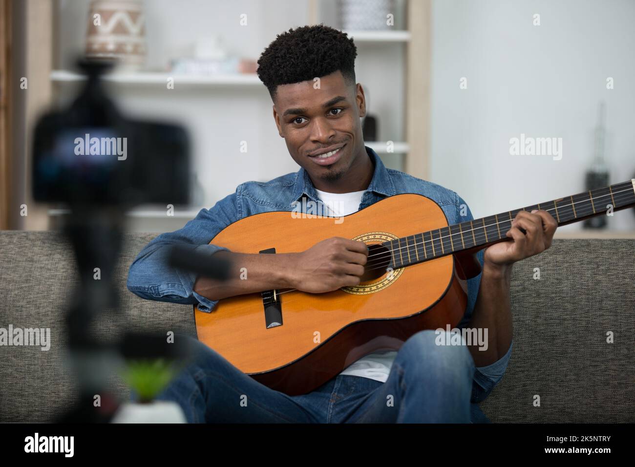 Musician live streaming playing hi-res stock photography and images - Alamy
