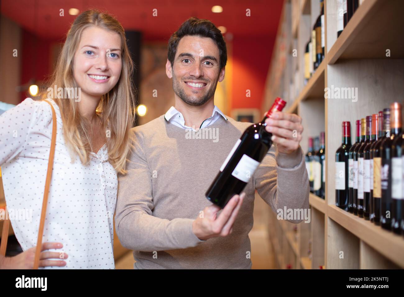 Beautiful woman deciding buy hi-res stock photography and images - Alamy