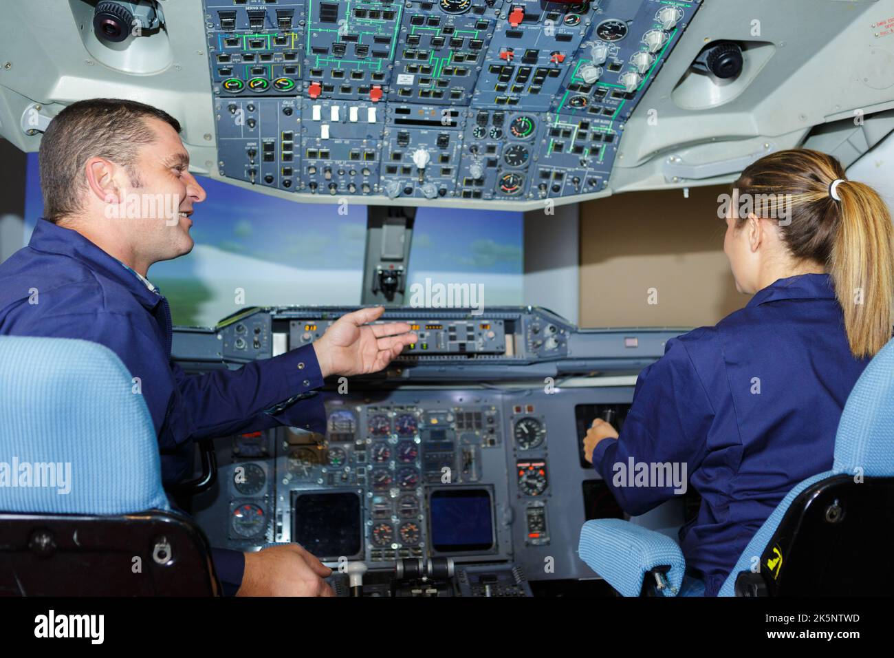 Man woman pilots training hi-res stock photography and images - Alamy