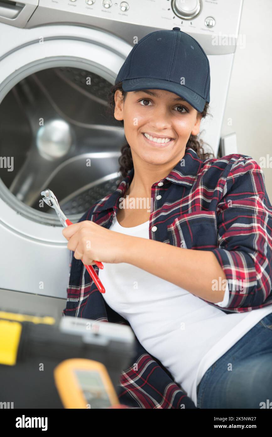Technician repairing washing machine hi-res stock photography and ...