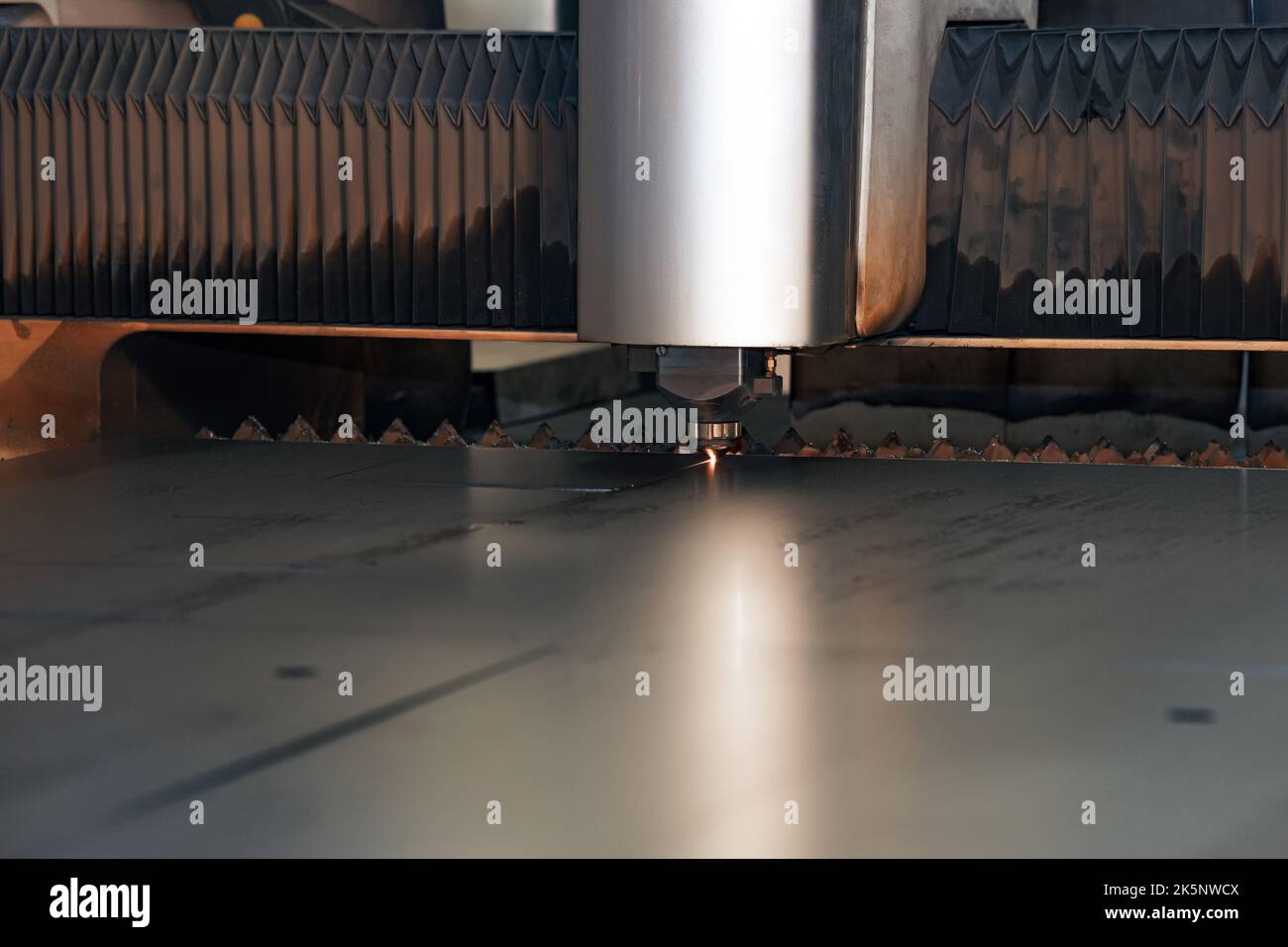 industrial laser cutting machine during metal sheet processing Stock ...