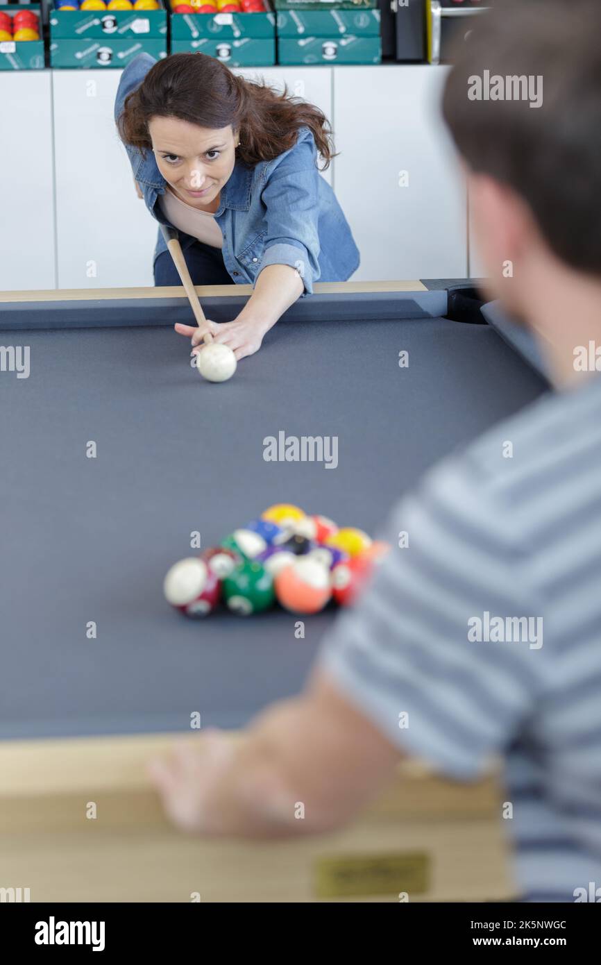 a couple playing snooker together in bar Stock Photo - Alamy