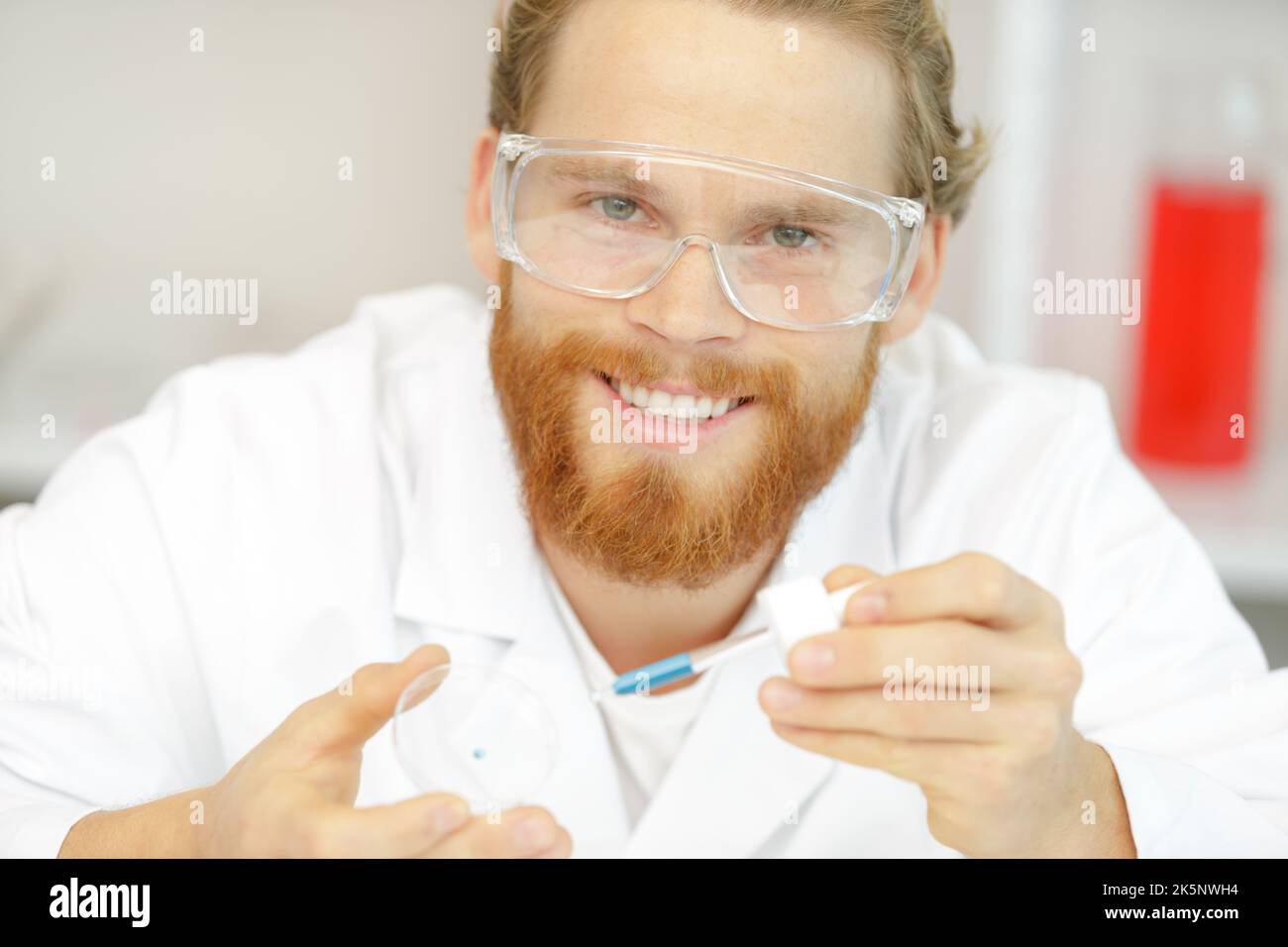 happy male lab worker smiling at camera Stock Photo - Alamy