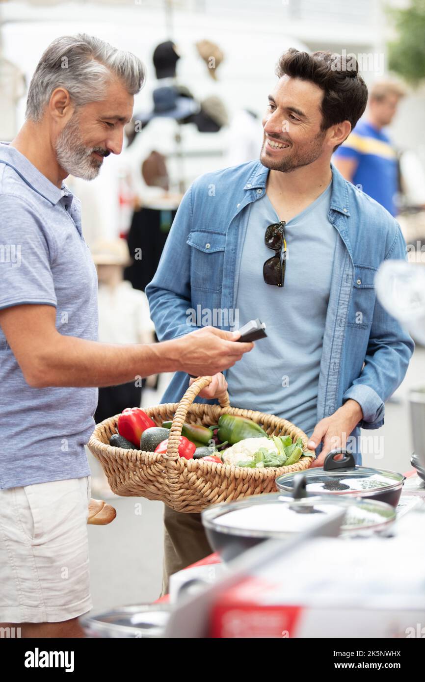 Buying food and drink necessities hi-res stock photography and images ...