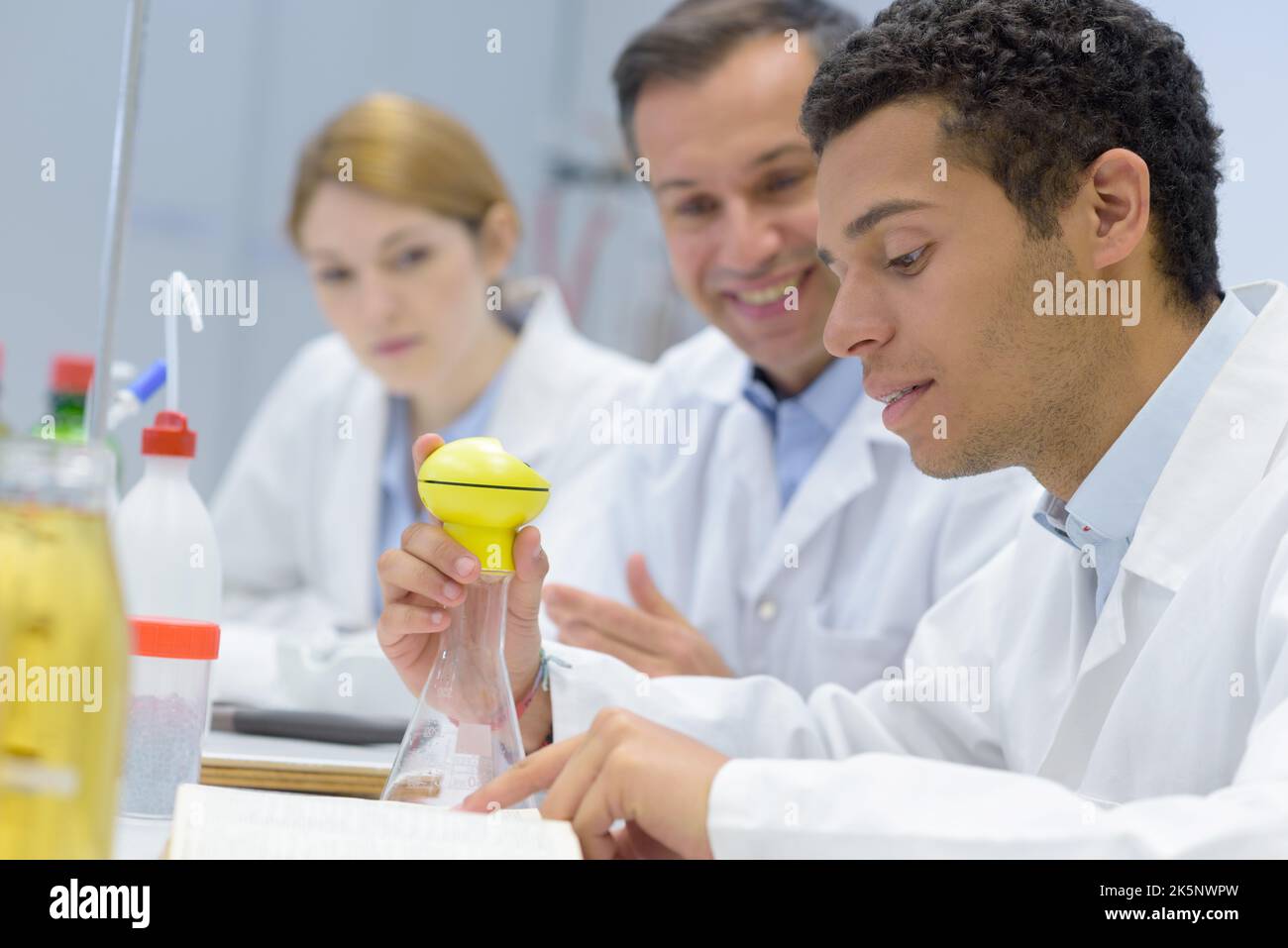 group of students in the lab Stock Photo - Alamy