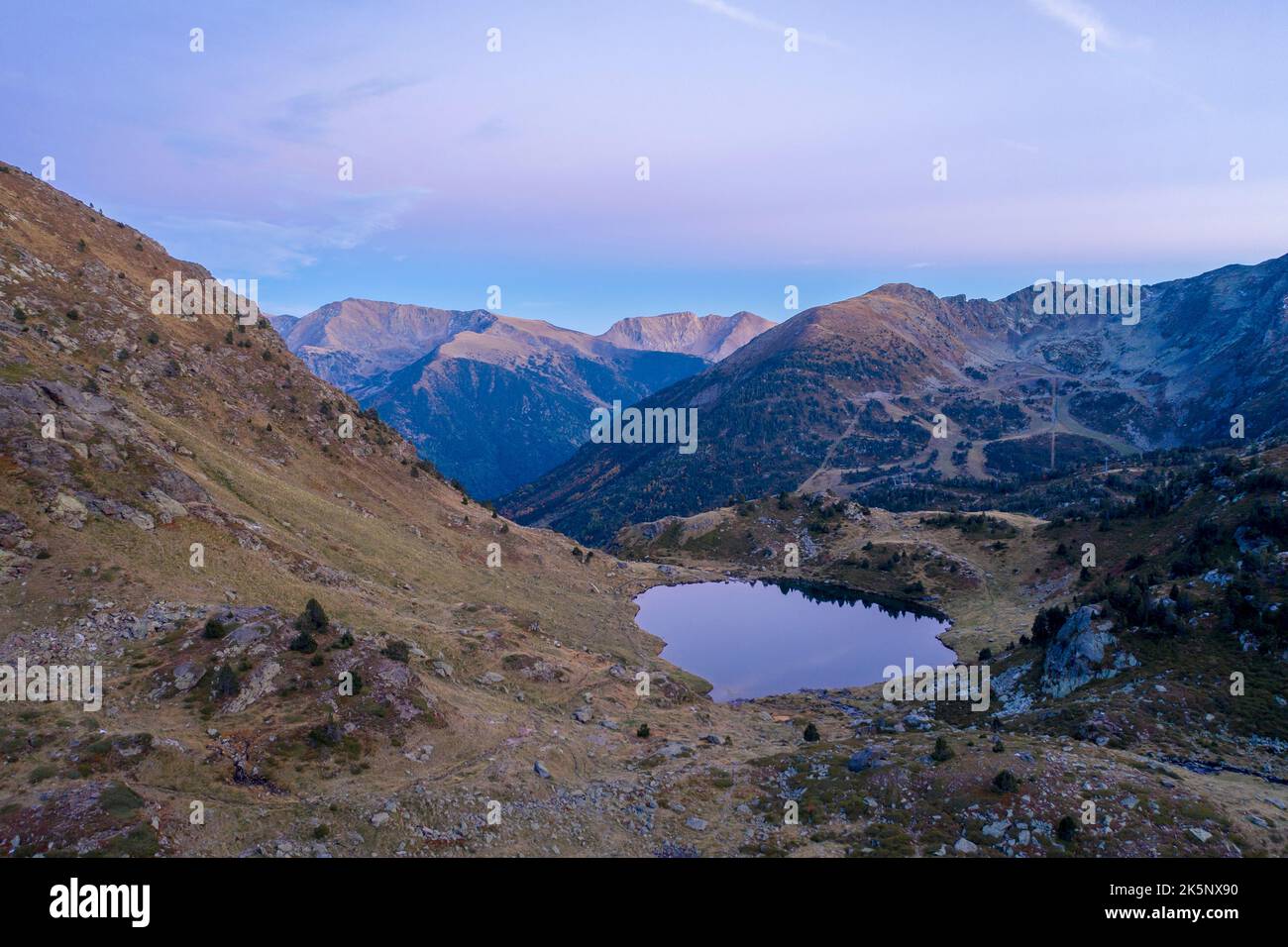drone view landscape photography of the first lagoon of tristaina at dusk, in ordino-arcalis ...