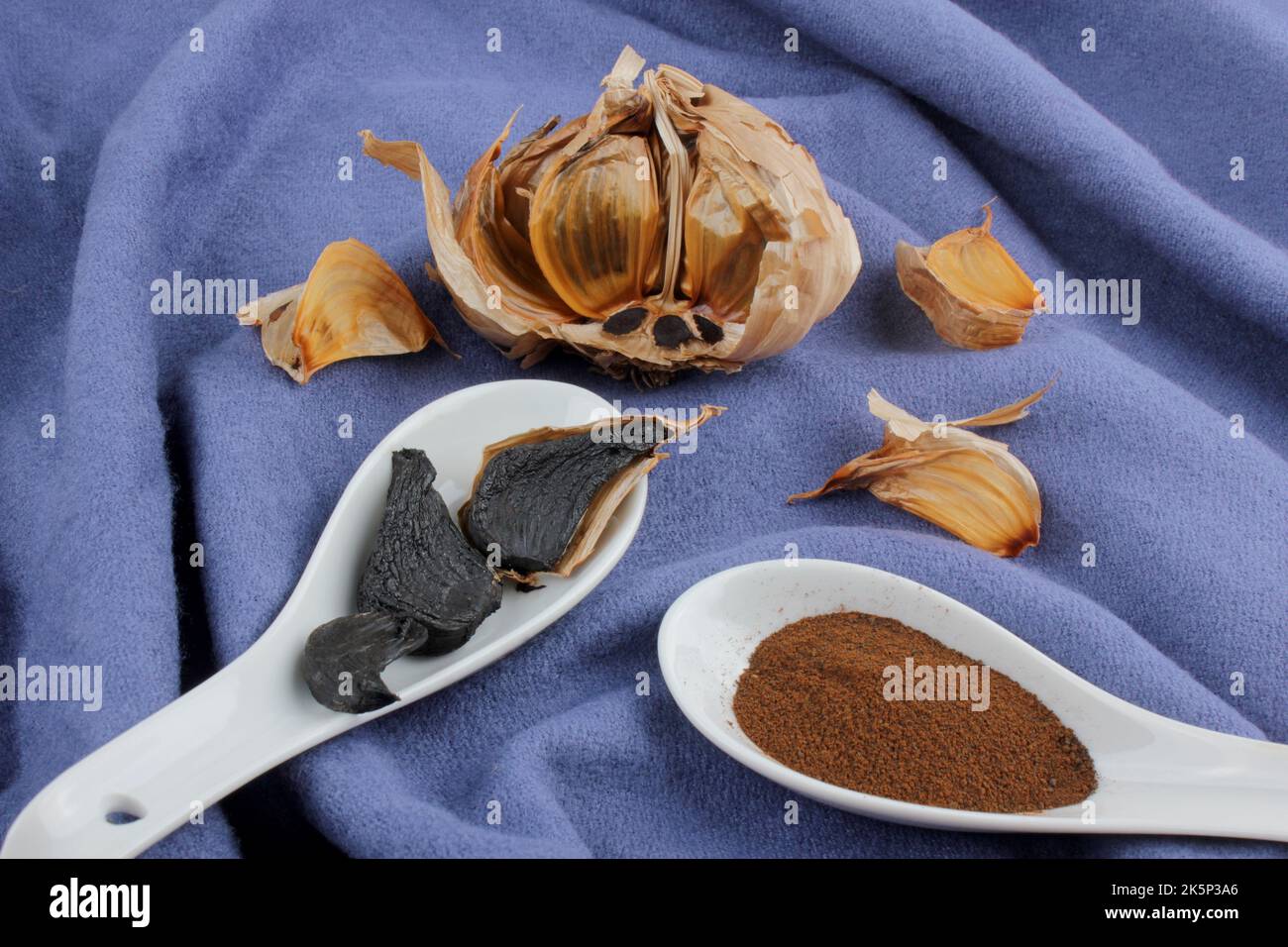 Black garlic made by fermenting process. Fermented foods. Healthy food ...