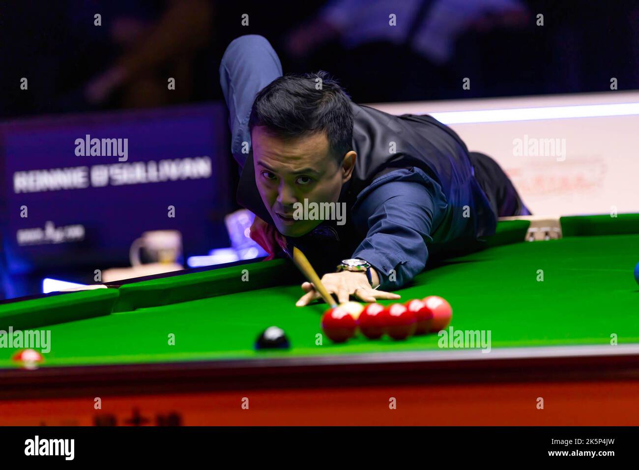 Marco Fu in action during the final match of Hong Kong Masters snooker ...