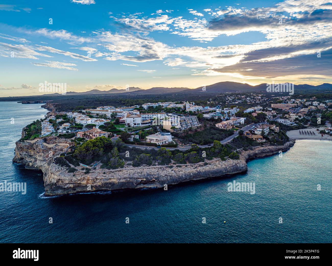 Sunset over Cala Anguila-Cala Mendia from a drone, Porto Cristo ...