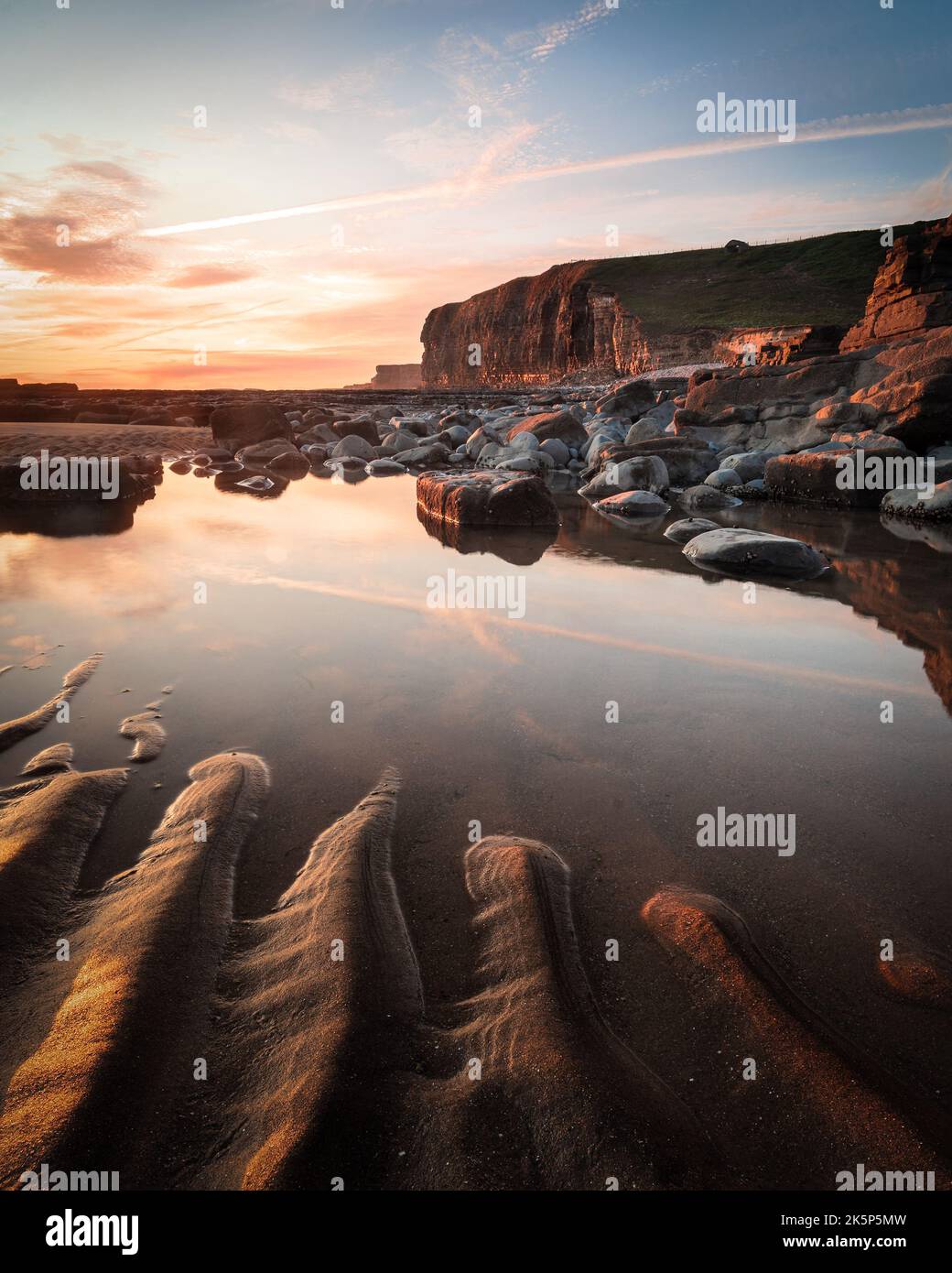 A mesmerizing scenery of a landscape during the sunset Stock Photo - Alamy