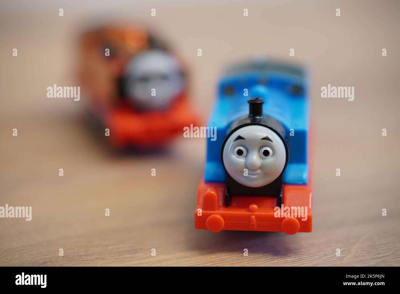 A Mattel brand toy model locomotive with a face from the Thomas And ...