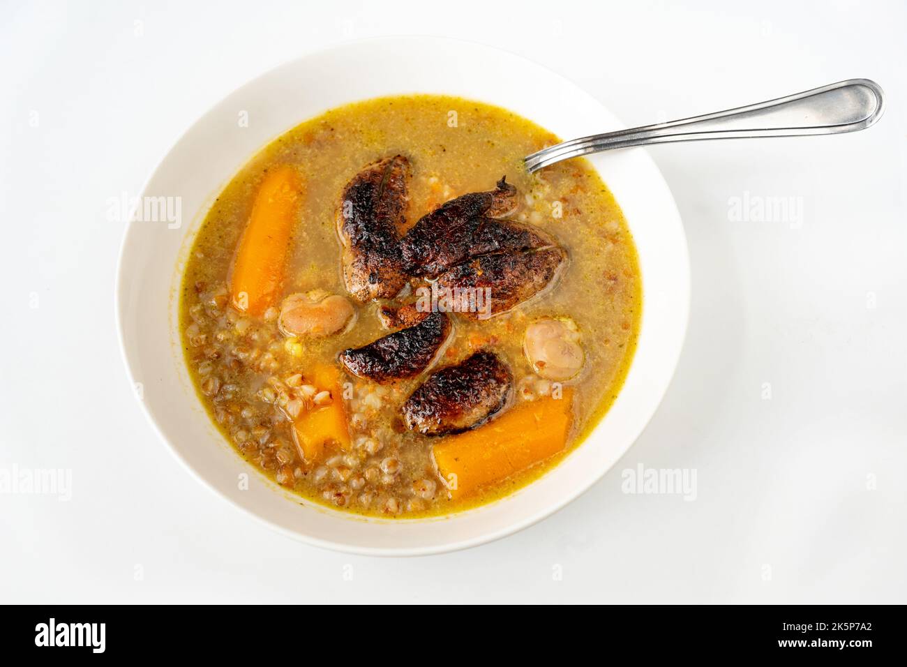 Rabbit soup with fried liver and kidney, boiled carrot and buckwheat in ...