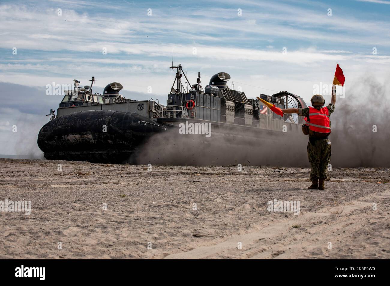 U.S. Navy Construction Mechanic 3rd Class Brandon Baker, assigned to ...