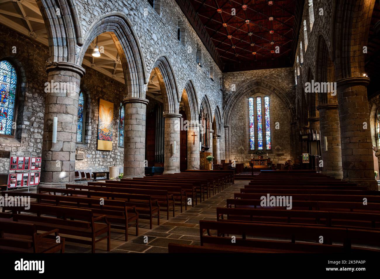 The interior of Ancient Church Cathedral with pillars, arches, and ...