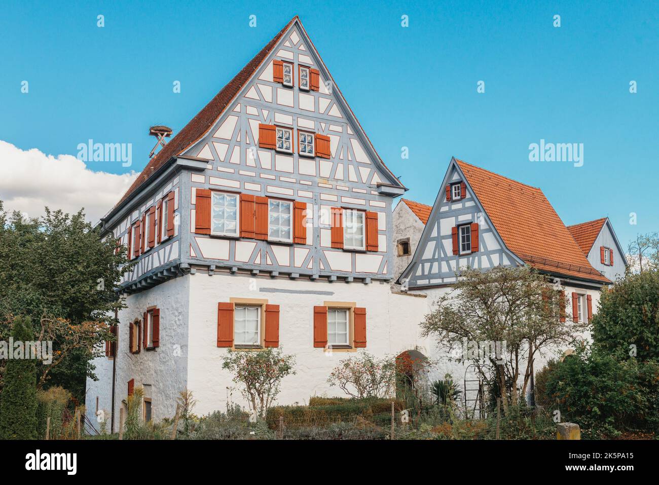 Traditional small house with beautiful outdoor decor facade in Germany ...