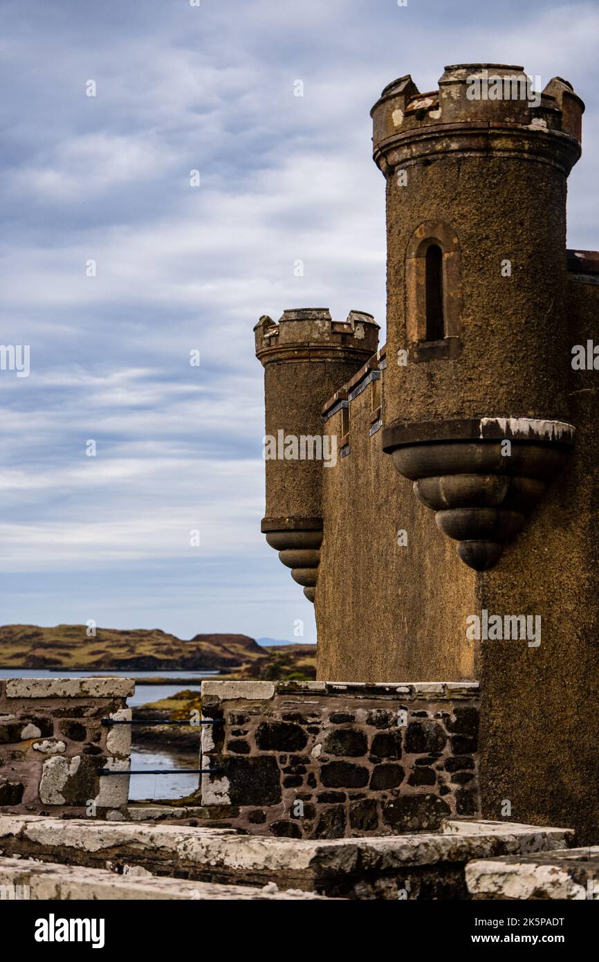 A vertical shot of the Dunvegan Castle on the Isle of Skye, Scotland UK ...