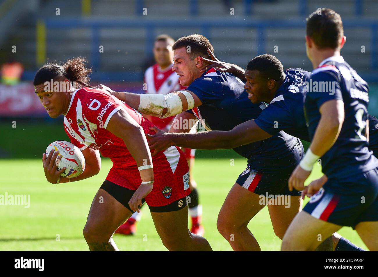 Halifax, England -8th October 2022 - Mosese Suli of Tonga makes a break ...