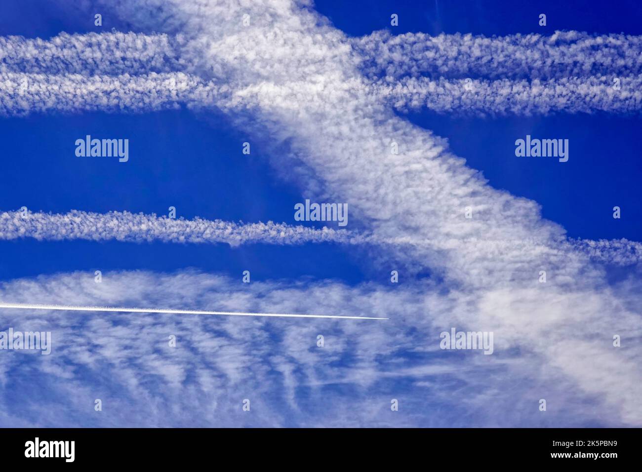 Contrails, vapor trails line-shaped clouds produced by aircraft engine ...