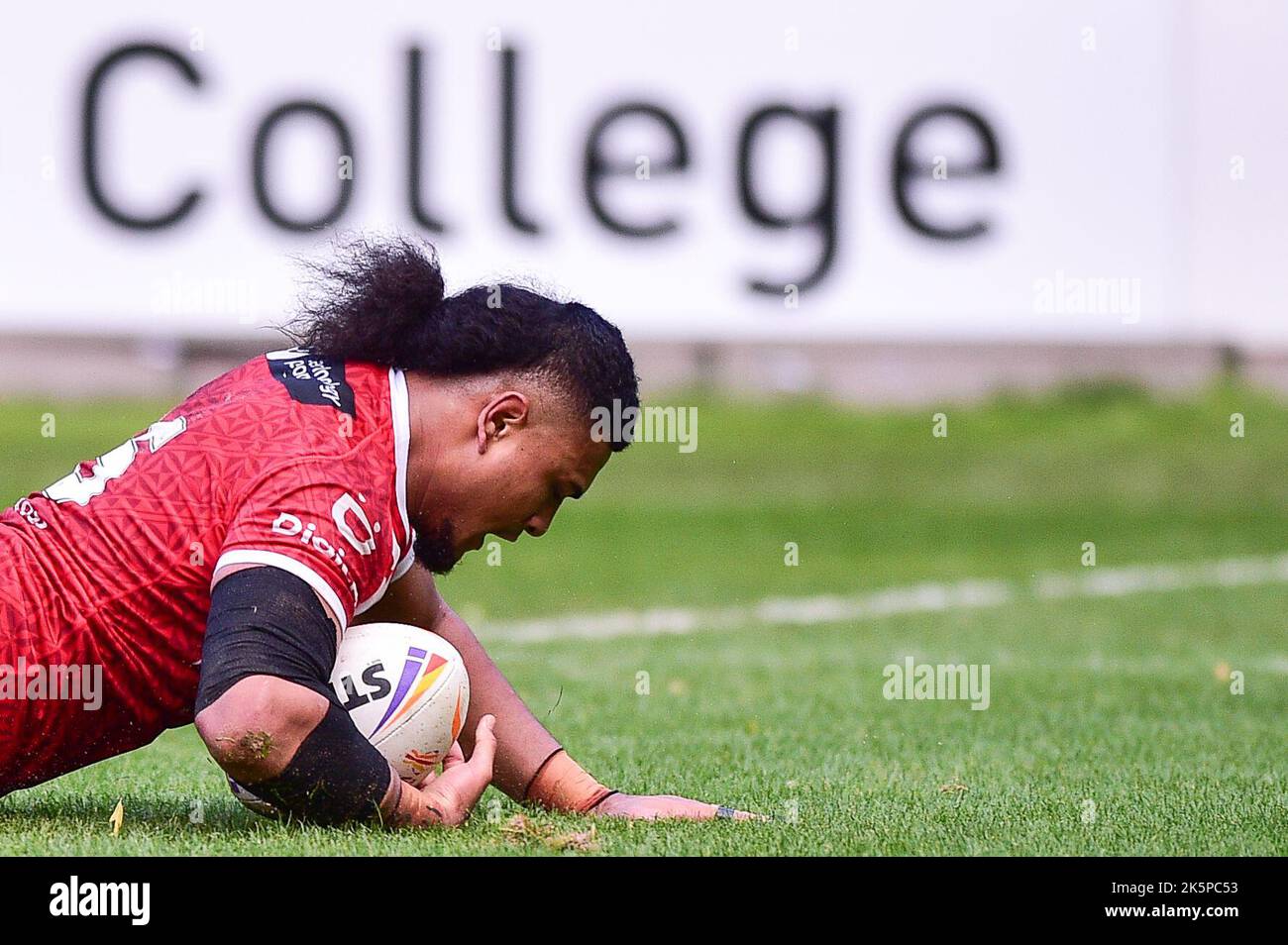 Halifax, England -8th October 2022 - Haumole Olakau'atu of Tonga scores ...