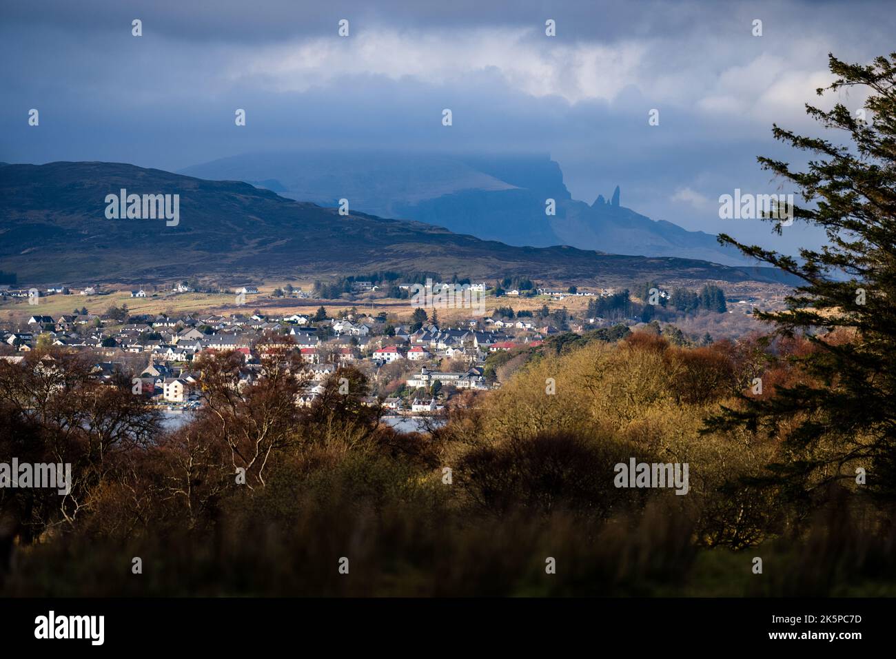 The town of Portree with Old Man of Storr and mountains on the Isle of ...