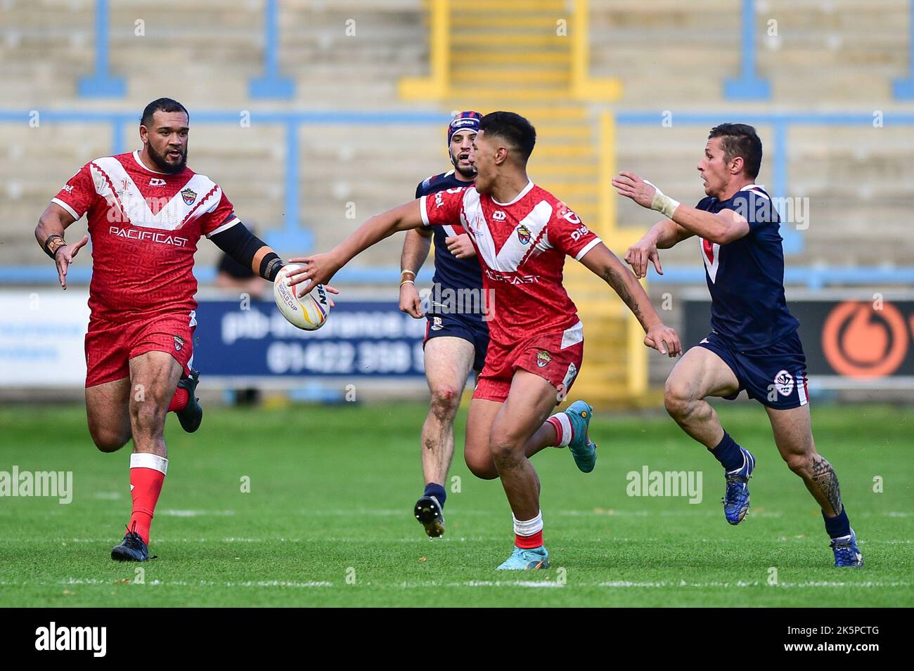 Halifax, England -8th October 2022 - Junior Amone of Tonga offloads ...