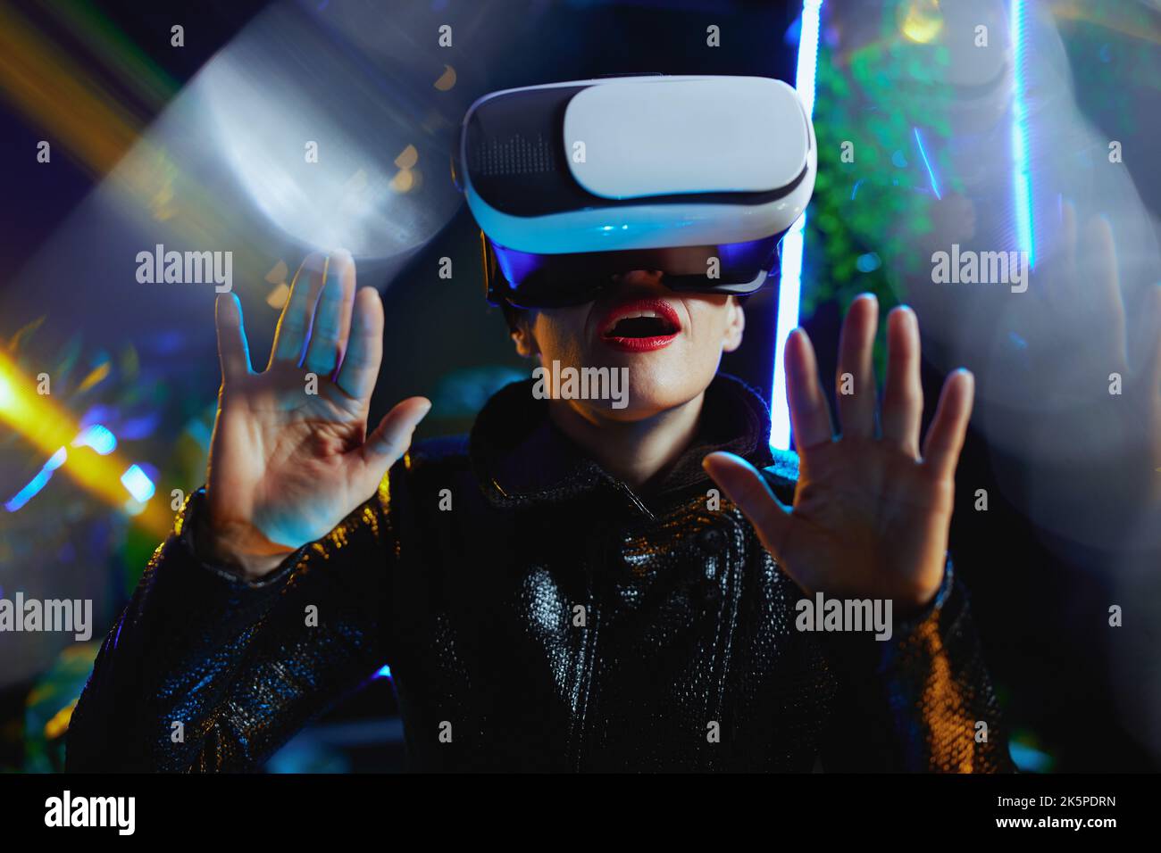 Metaverse headset shocked woman hi-res stock photography and images - Alamy