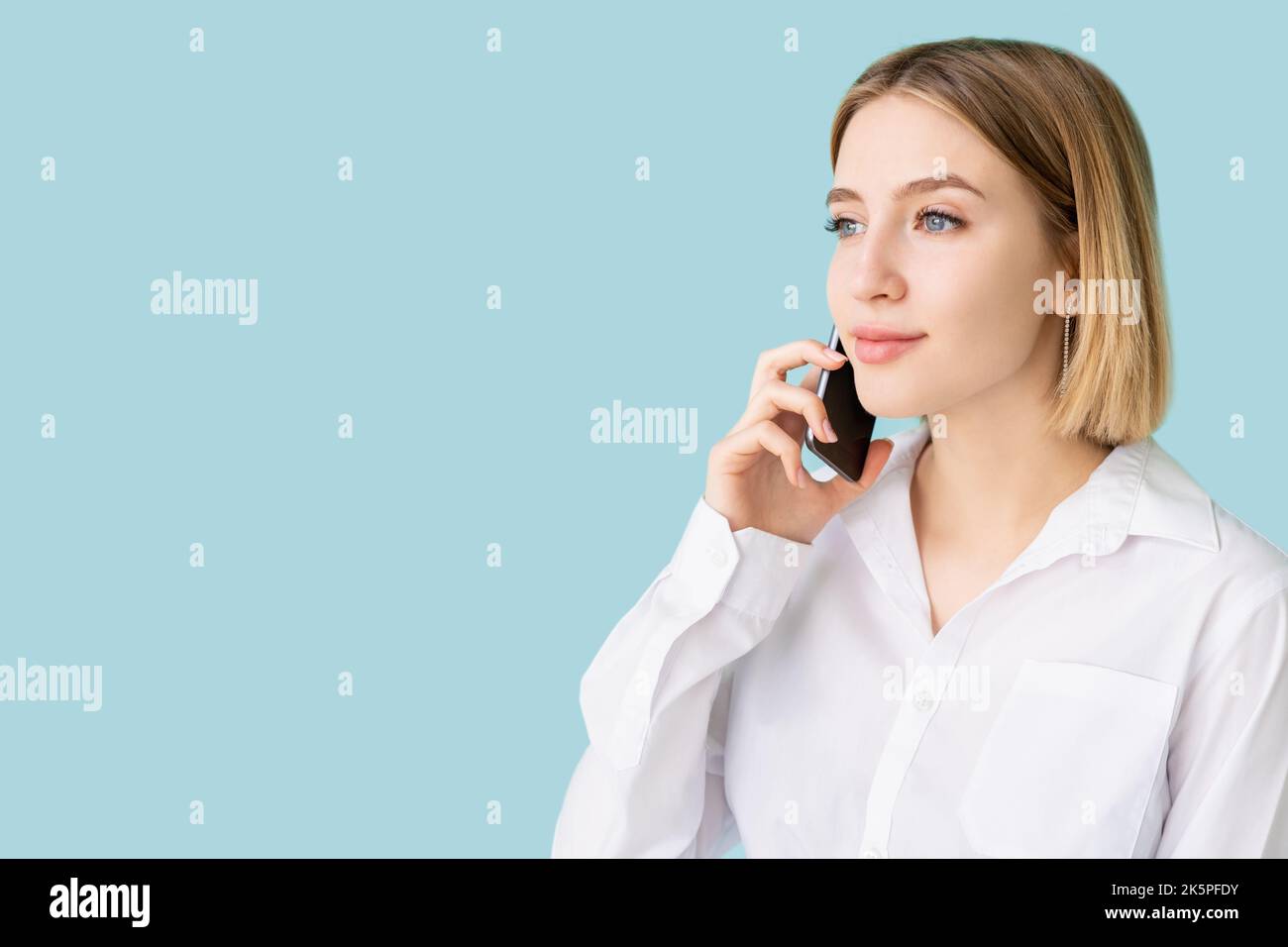 Pleasant call. Business woman. Mobile communication. Advertising ...