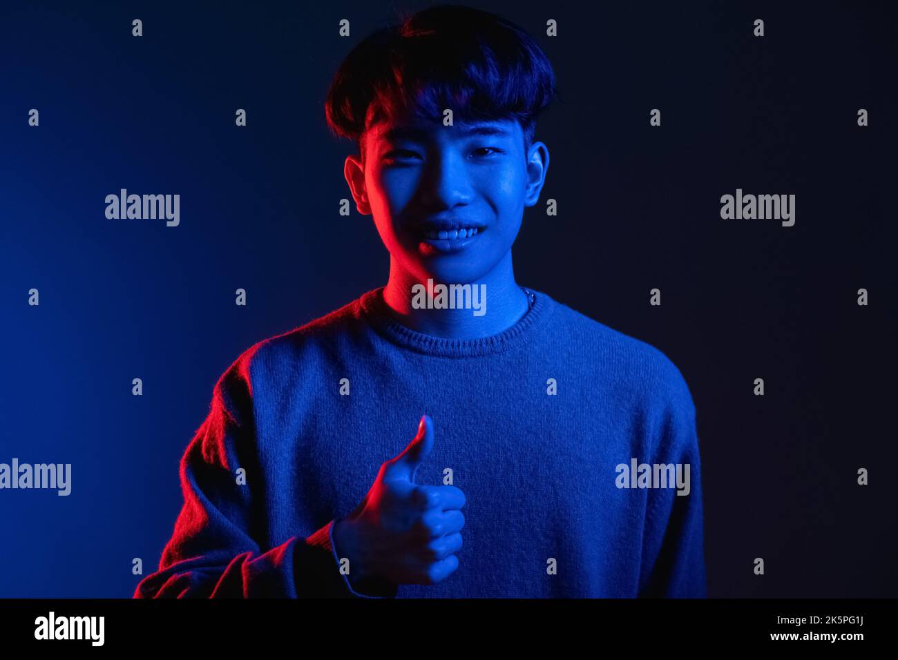 approving man like gesture neon light thumbs up Stock Photo - Alamy