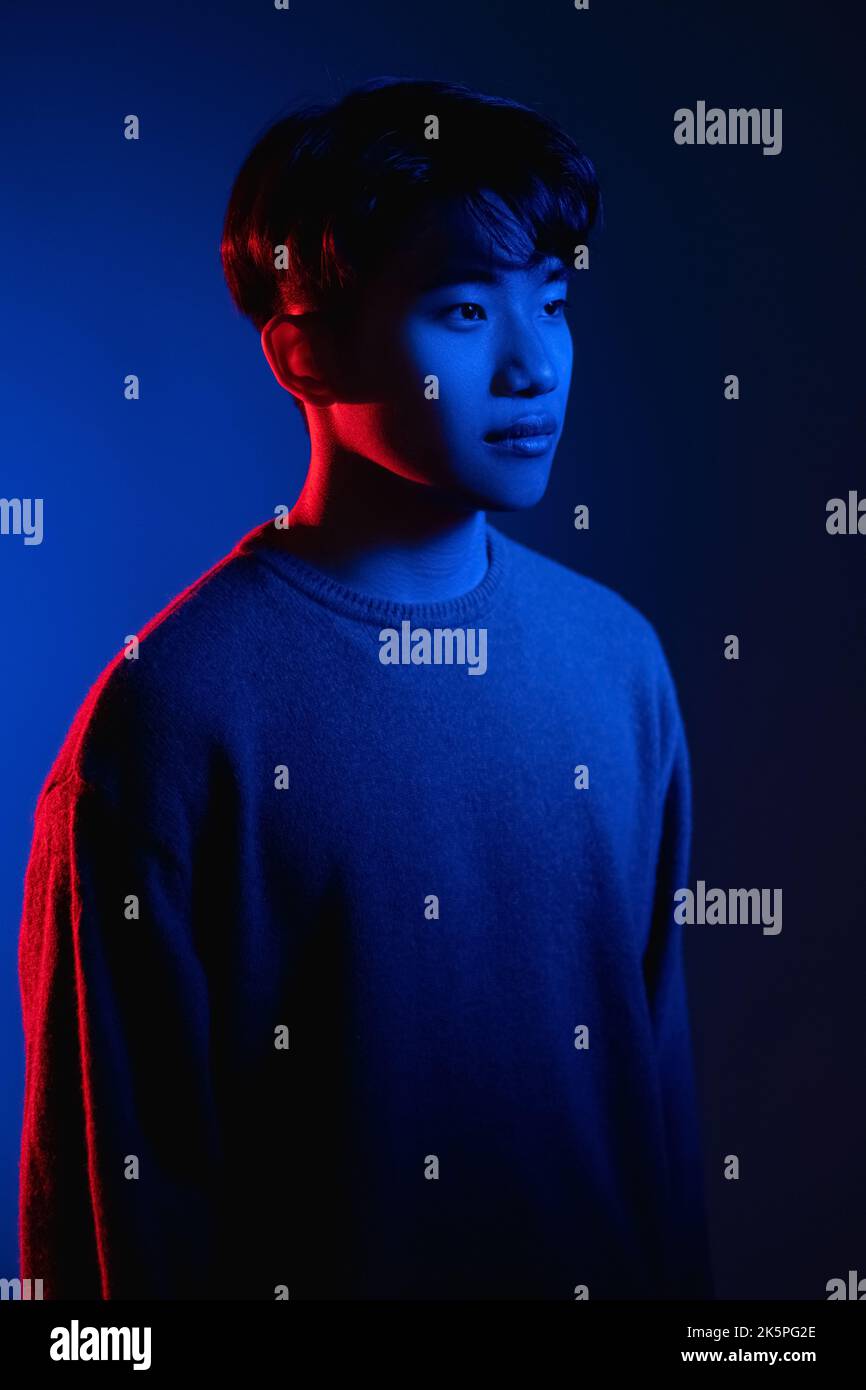 synth wave portrait cyberpunk man neon light blue Stock Photo - Alamy