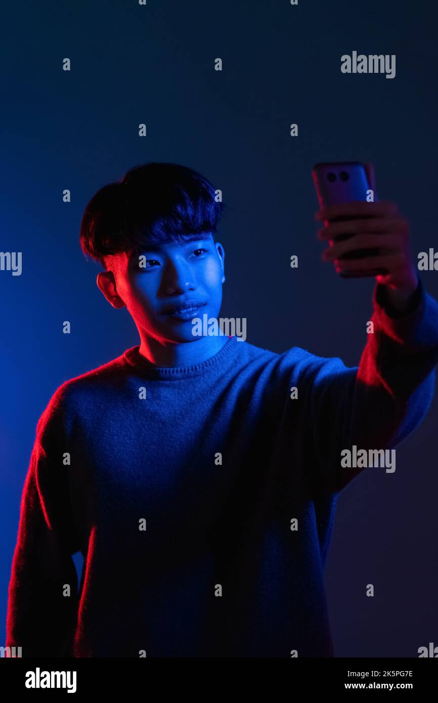 Neon light selfie hi-res stock photography and images - Alamy
